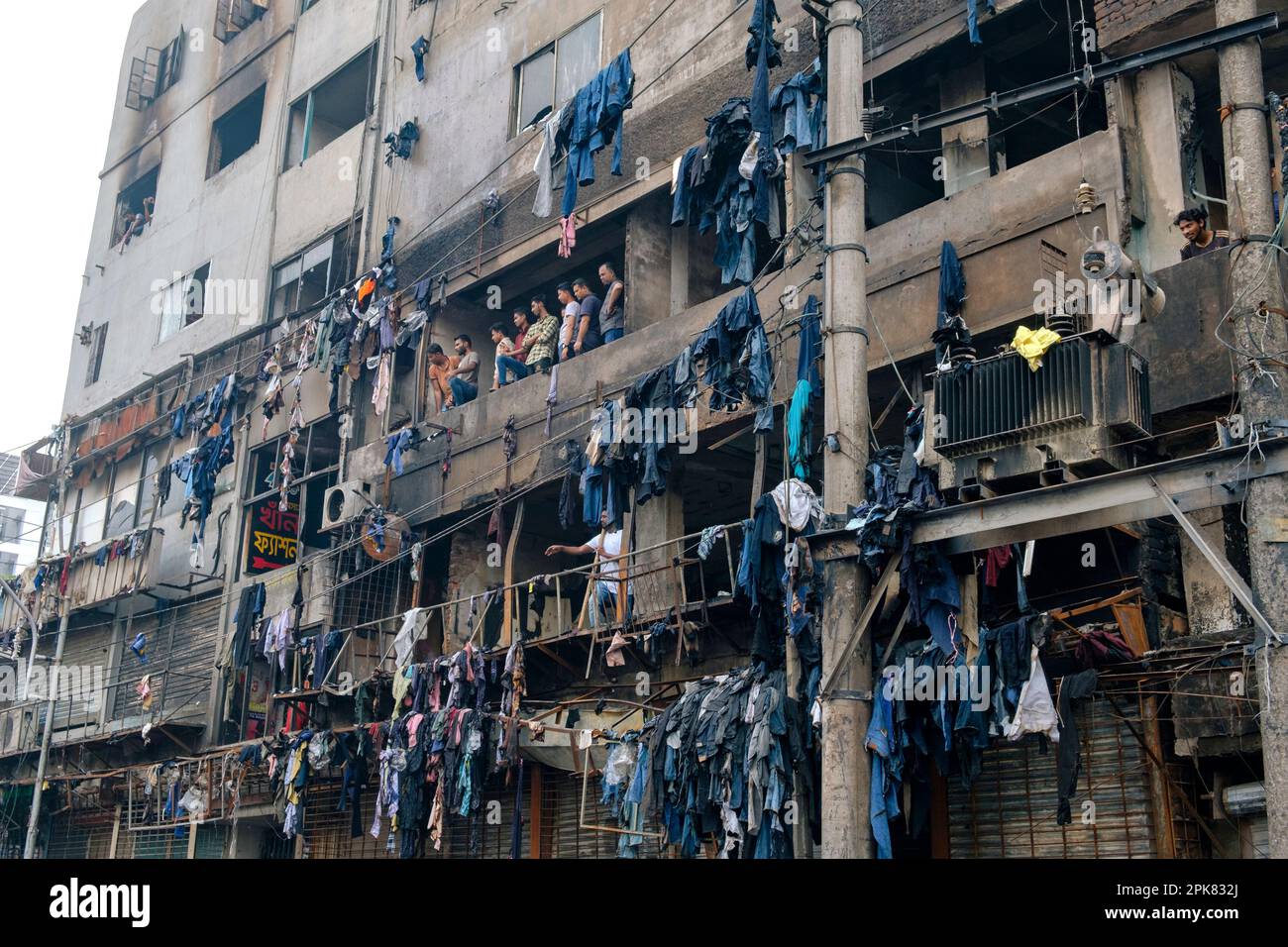 Bangladesh: 04/04/2023, Burnt and discarded clothes are seen hanging ...
