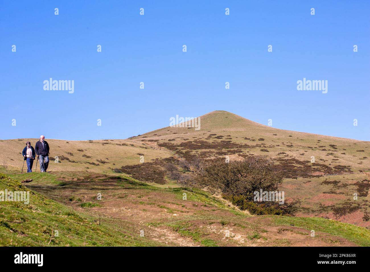 Walkers walking up to the summit of Lose Hill, the start of the great ...