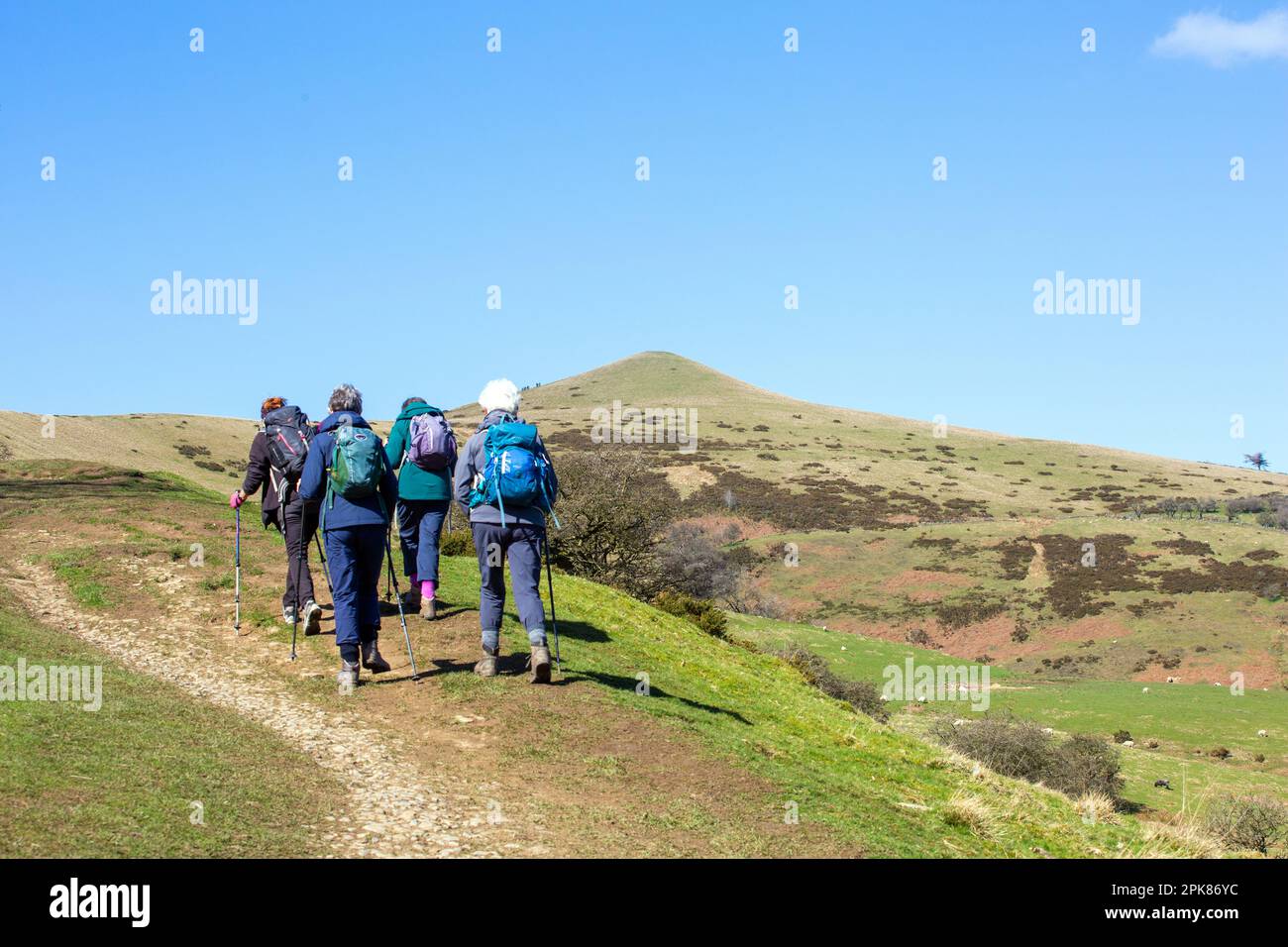 Walkers walking up to the summit of Lose Hill, the start of the great ...