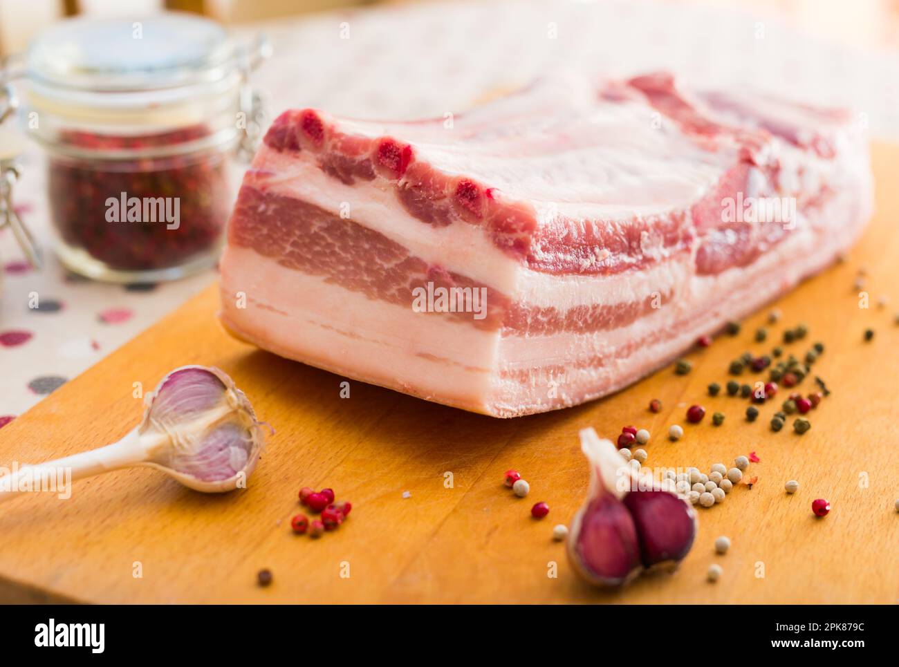 cooking traditional homemade lard with spices. pork belly with layer on ...