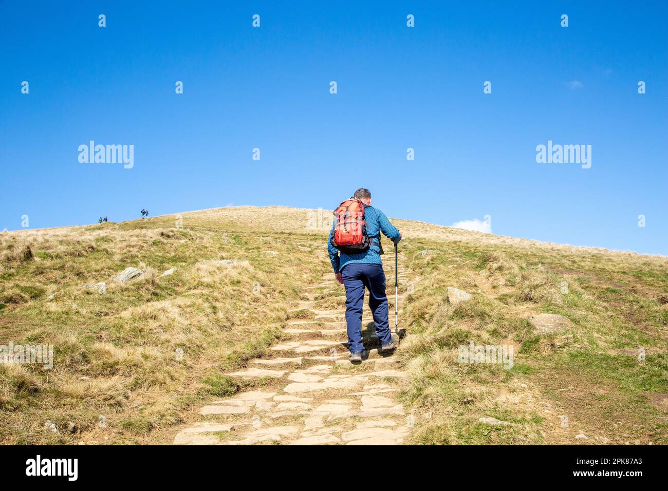 Walkers walking up to the summit of Lose Hill, the start of the great ...