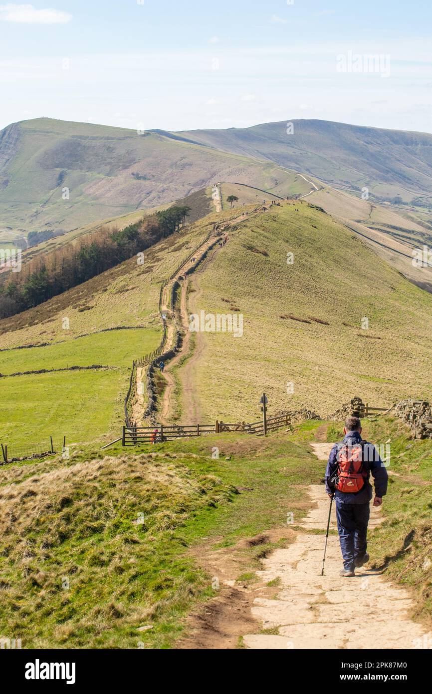 Man walking backpacking along the great ridge towards Back Tor and Mam ...