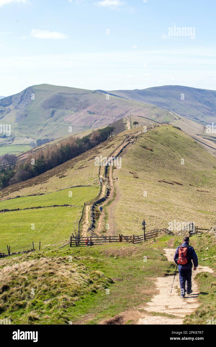 Man walking backpacking along the great ridge towards Back Tor and Mam ...