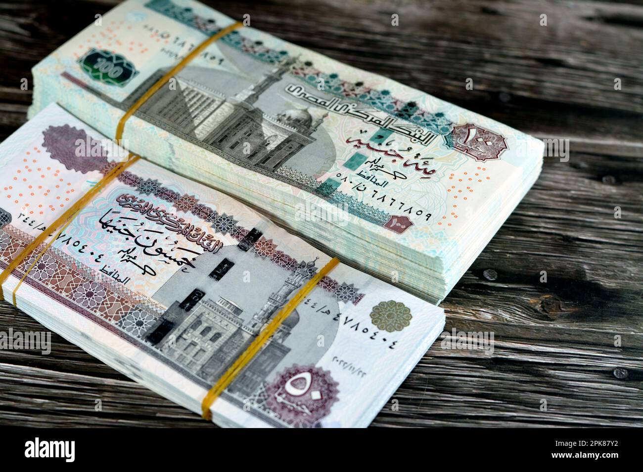 Stacks of Egypt money banknote bills of 100 and 50 EGP LE one hundred ...