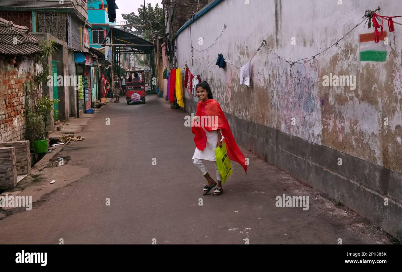 Indian woman in alley, Kolkata, India Stock Photo - Alamy