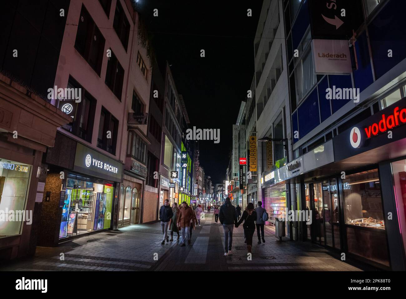 Picture of Hohe Strasse with stores and shops on a saturday night in ...
