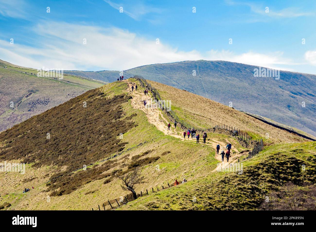 Walkers on the Great Ridge in the Derbyshire Peak District high above ...