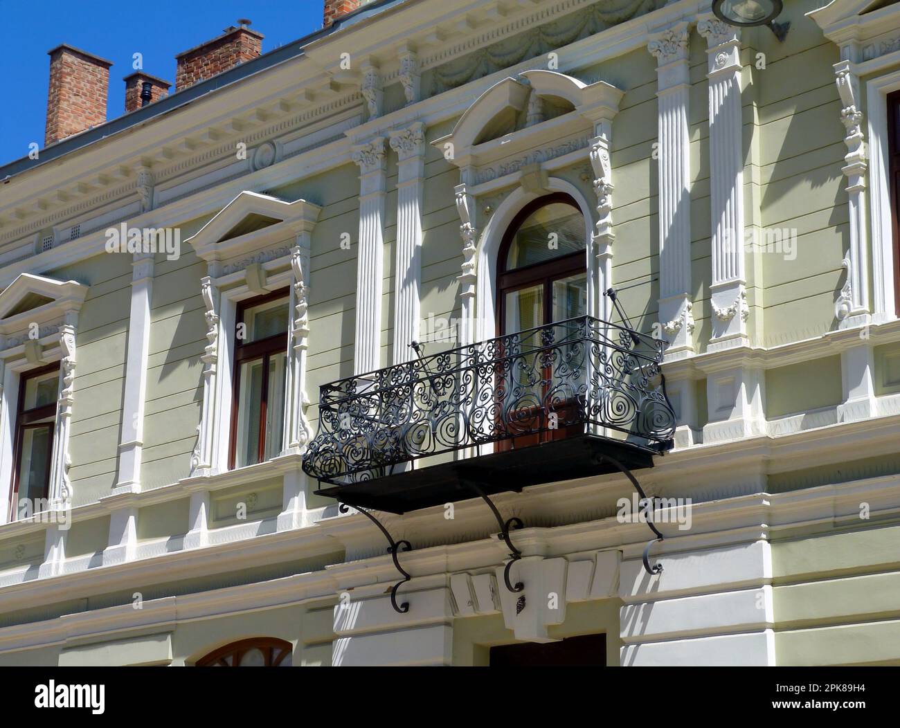 decorative wrought iron balcony balustrade. old classic building facade ...