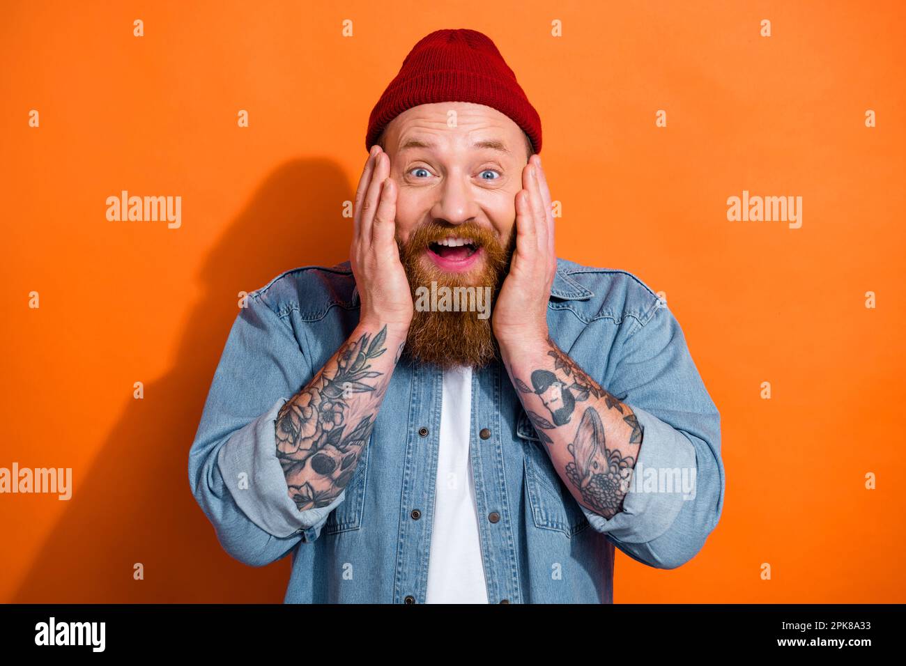 Portrait of impressed positive person arms touch cheeks open mouth ...