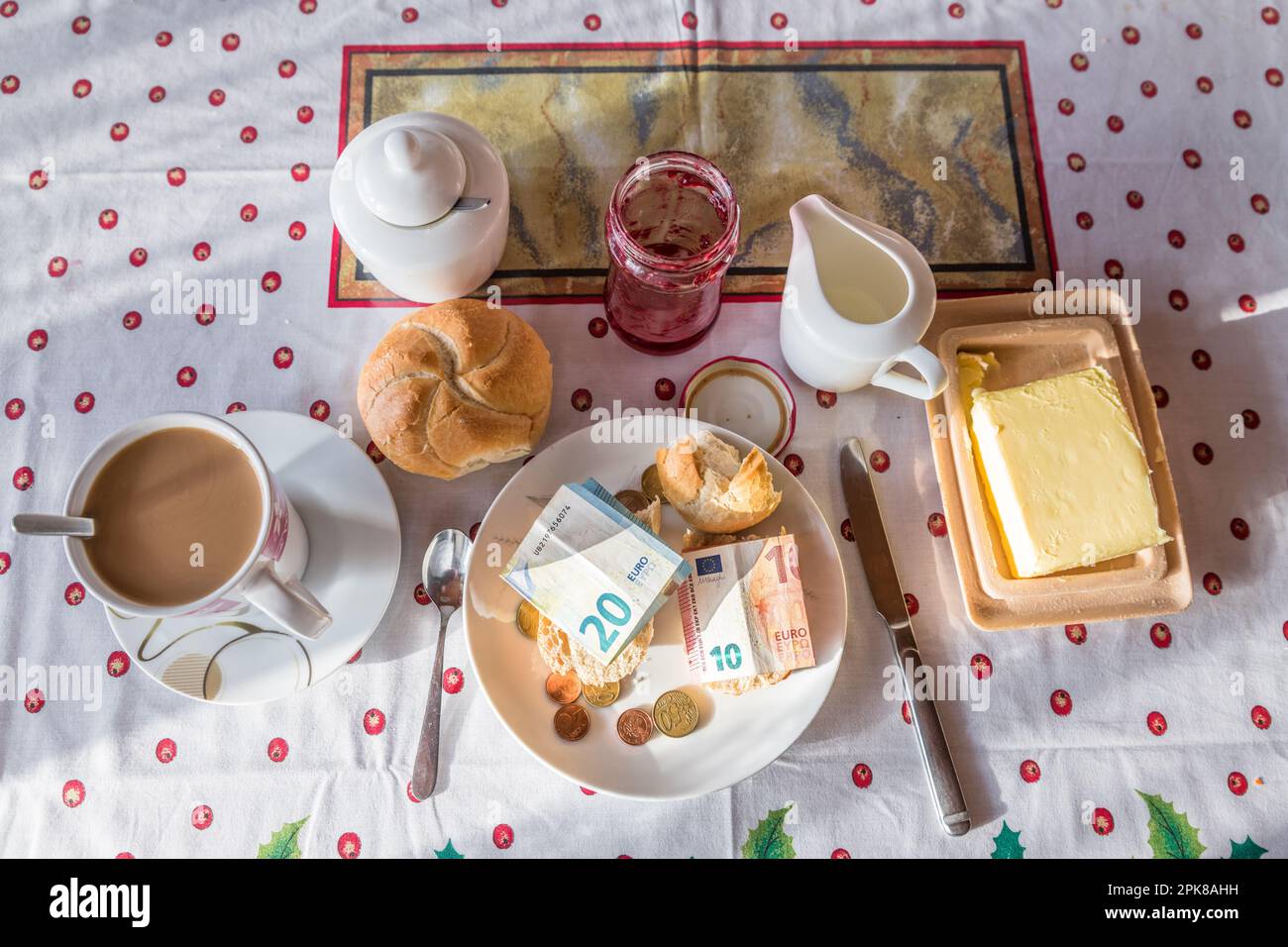 Set breakfast table with breakfast of coffee sugar milk and butter and ...