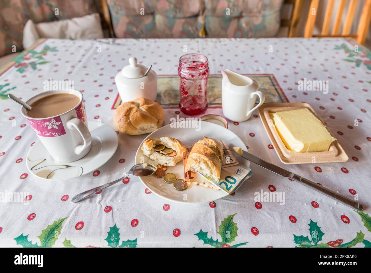 Set breakfast table with breakfast of coffee sugar milk and butter and ...