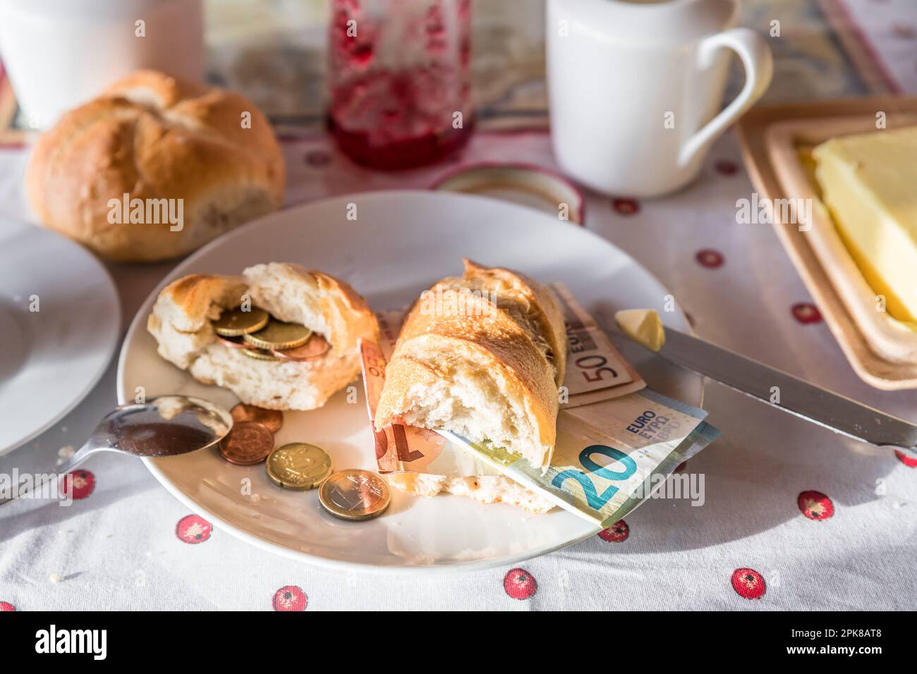 Set breakfast table with breakfast of coffee sugar milk and butter and ...