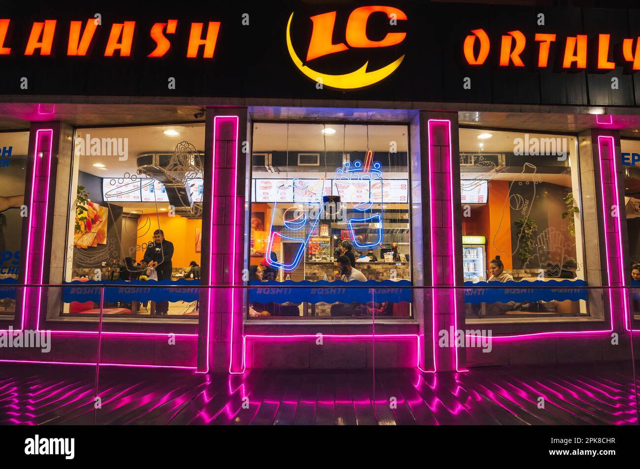 SHYMKENT, KAZAKHSAN - JANUARY 23, 2023: fast food cafe showcase with ...