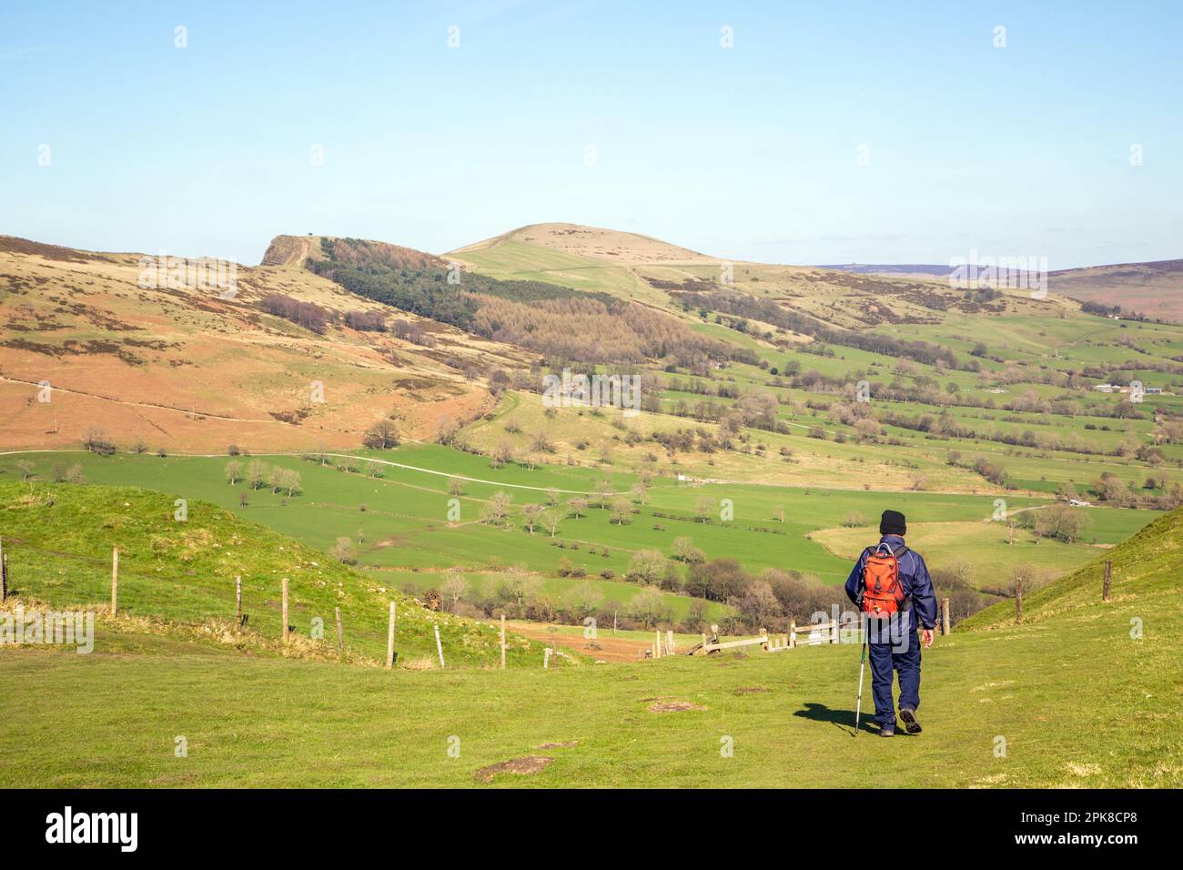 Man backpacking hill walking in the English Peak District above the ...