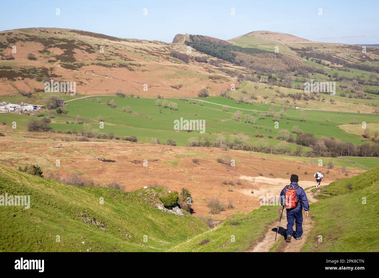 Man backpacking hill walking in the English Peak District above the ...