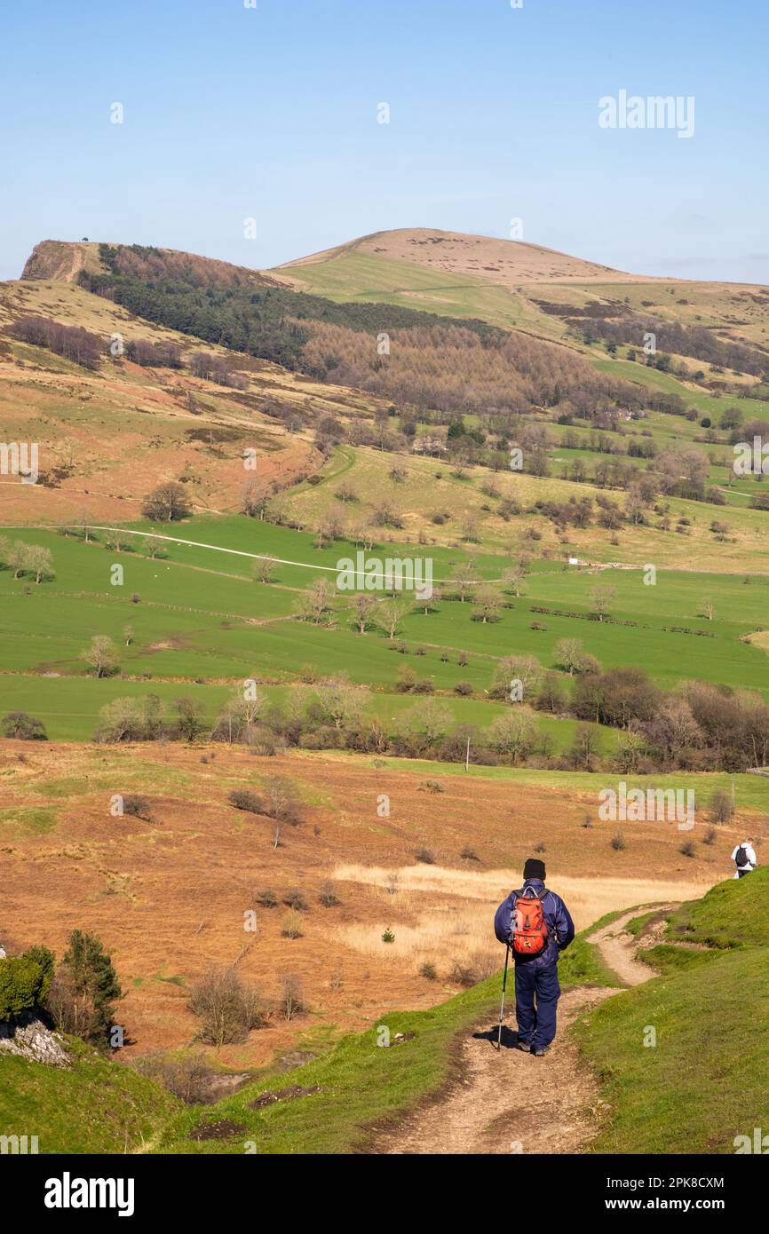 Man backpacking hill walking in the English Peak District above the ...