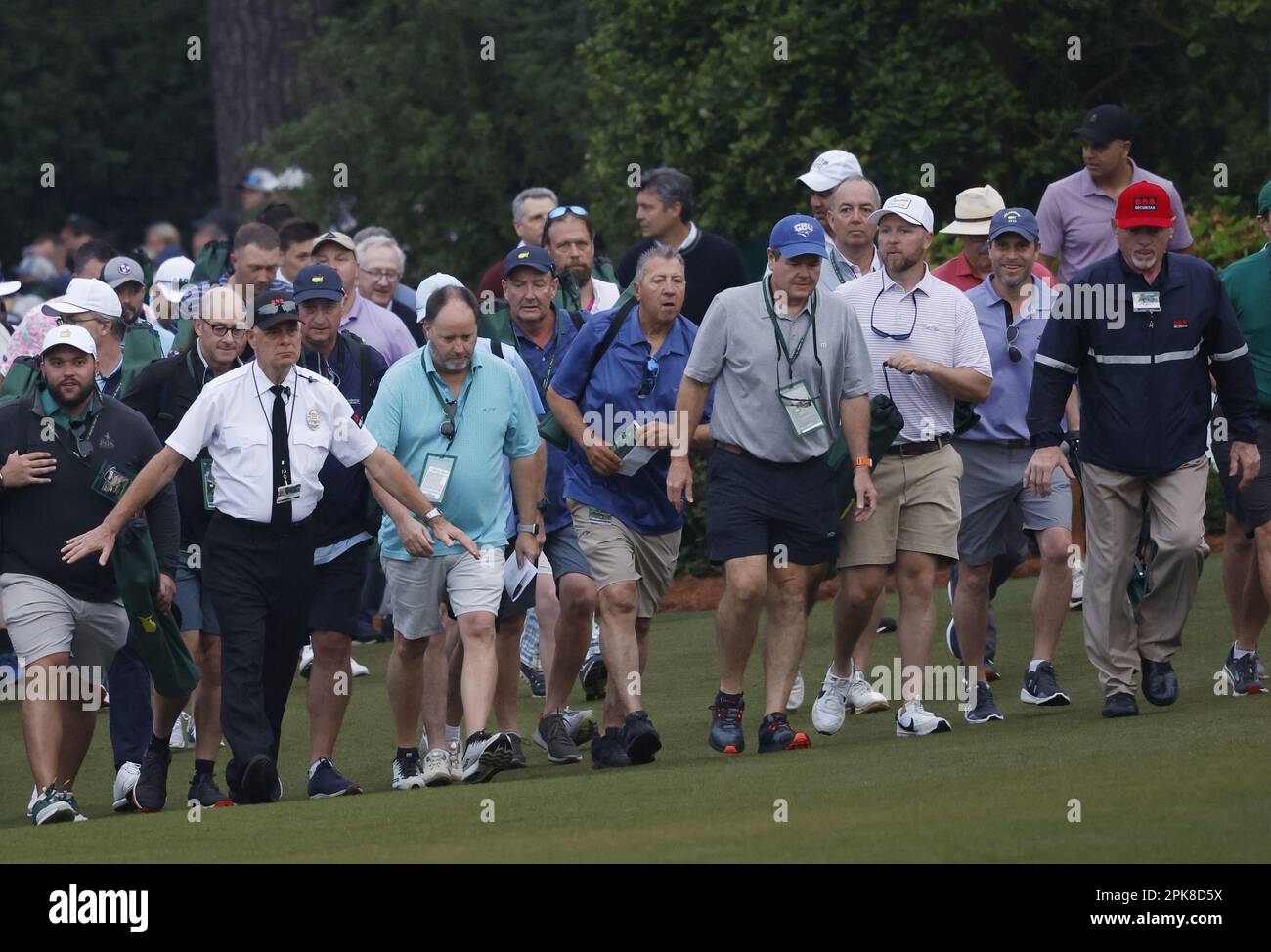 Augusta, United States. 06th Apr, 2023. A security guard holds back a ...