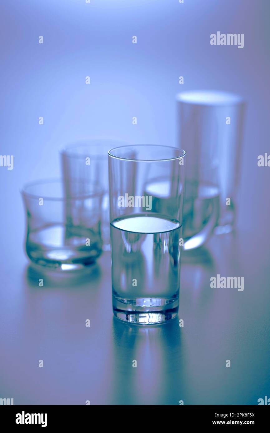 Is your glass half full or half empty Stock Photo - Alamy