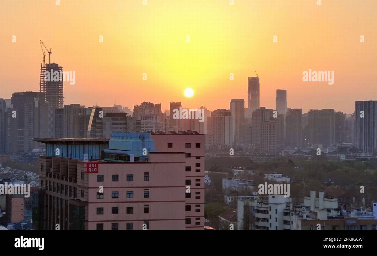 SHANGHAI, CHINA - MARCH 28, 2023 - The early morning sun shines on high ...