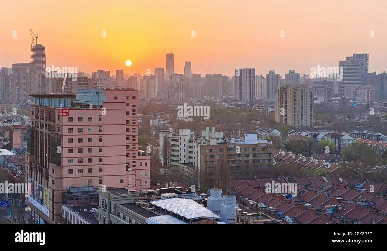 SHANGHAI, CHINA - MARCH 28, 2023 - The early morning sun shines on high ...