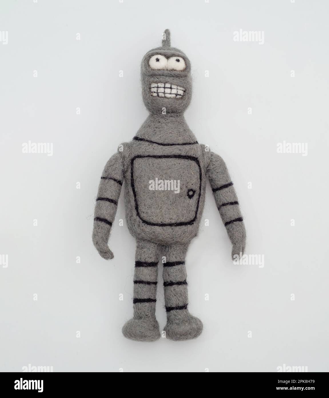 Felted toy made of wool. Robot Bender on white background Stock Photo ...