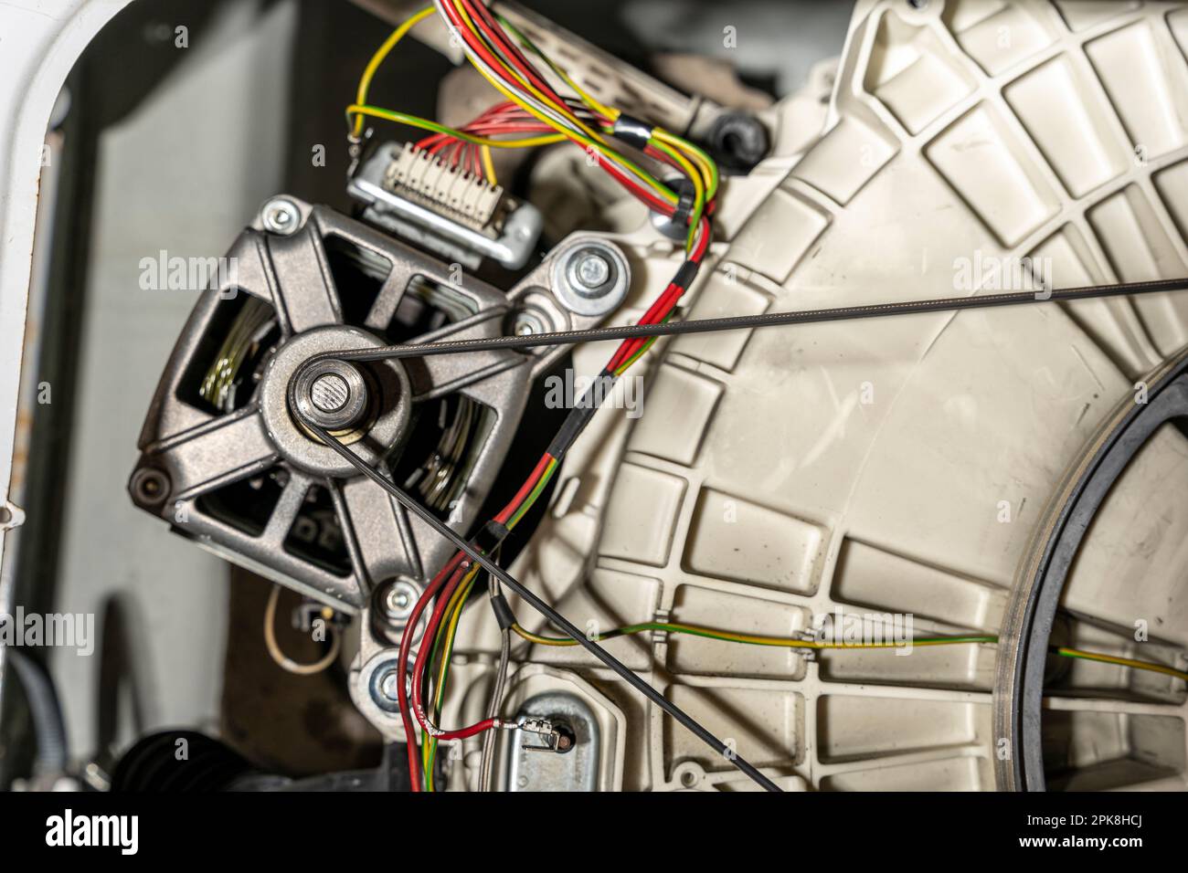 Electric motor and belt drive of an electric washing machine Stock ...