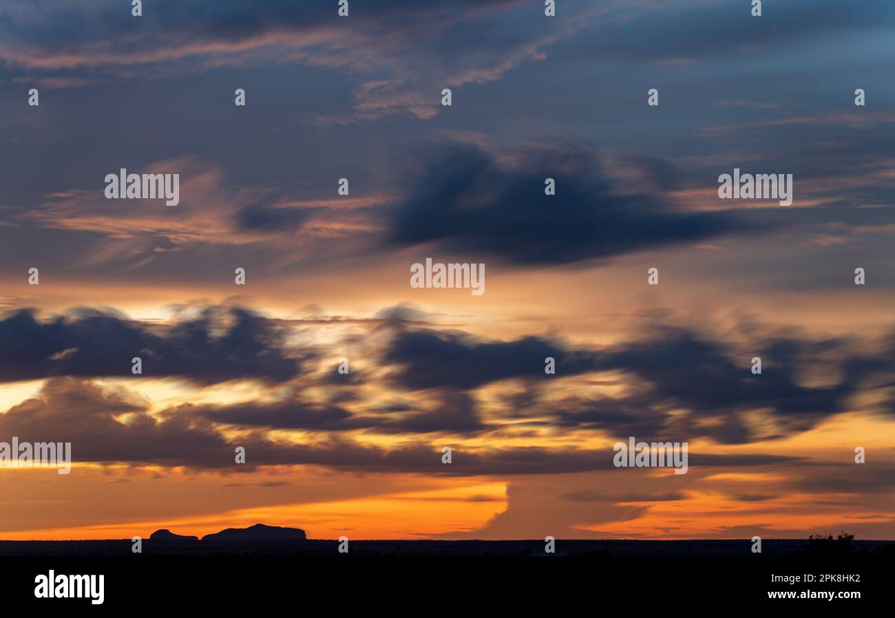 Long Exposure Sunset Sky with Mesas Silhouette Stock Photo - Alamy
