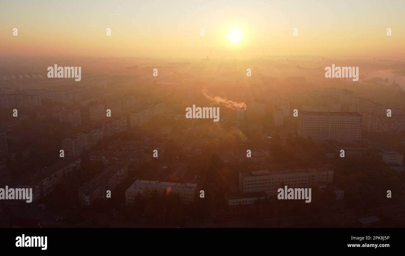 Drone rising over sunny city hi-res stock photography and images - Alamy