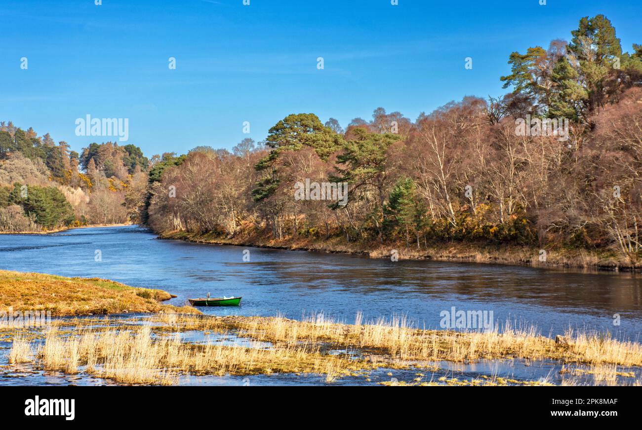 Caledonian Canal at Dochgarroch Scotland green salmon fishing boat on ...