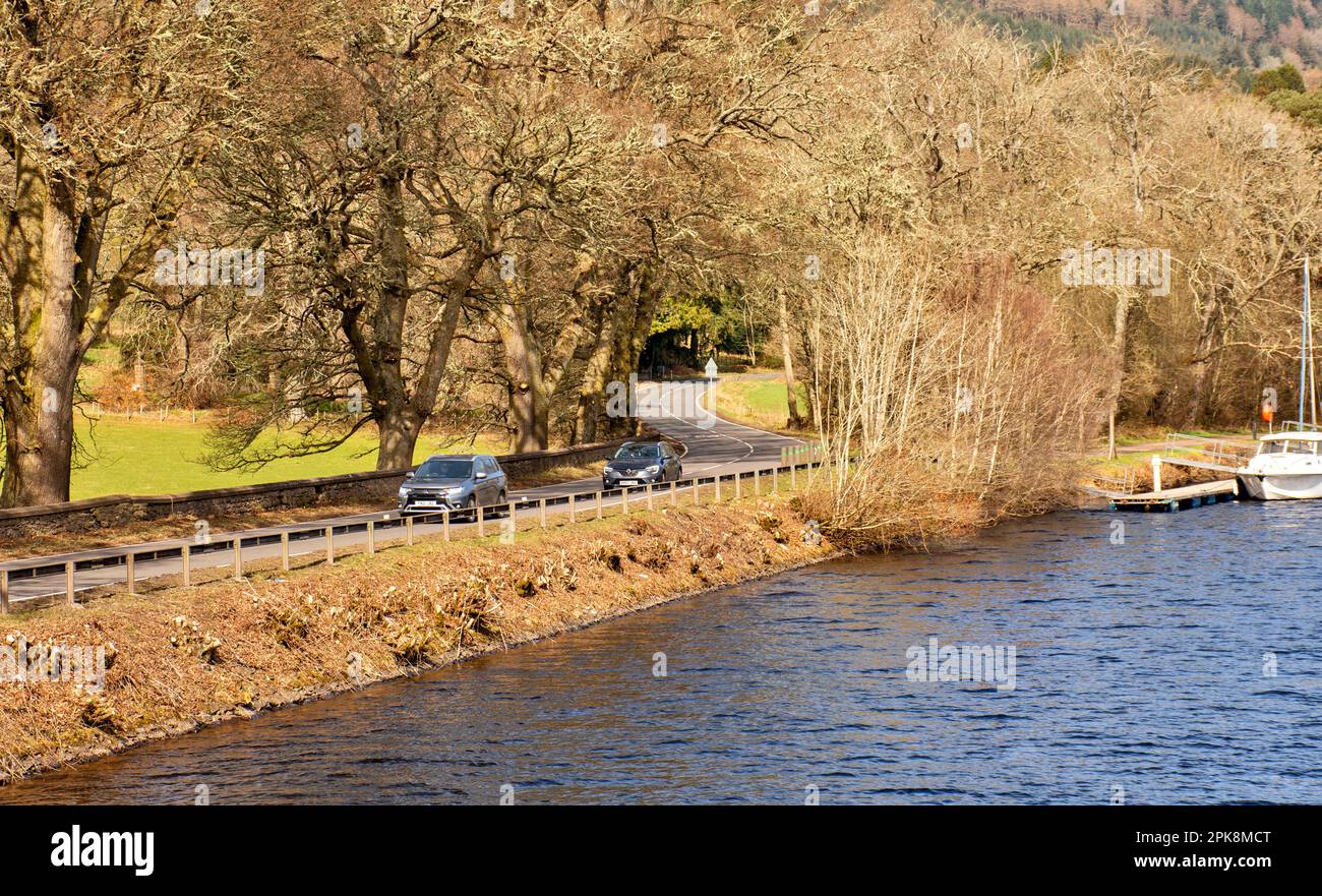 Caledonian Canal at Dochgarroch Scotland traffic on the busy A82 road ...