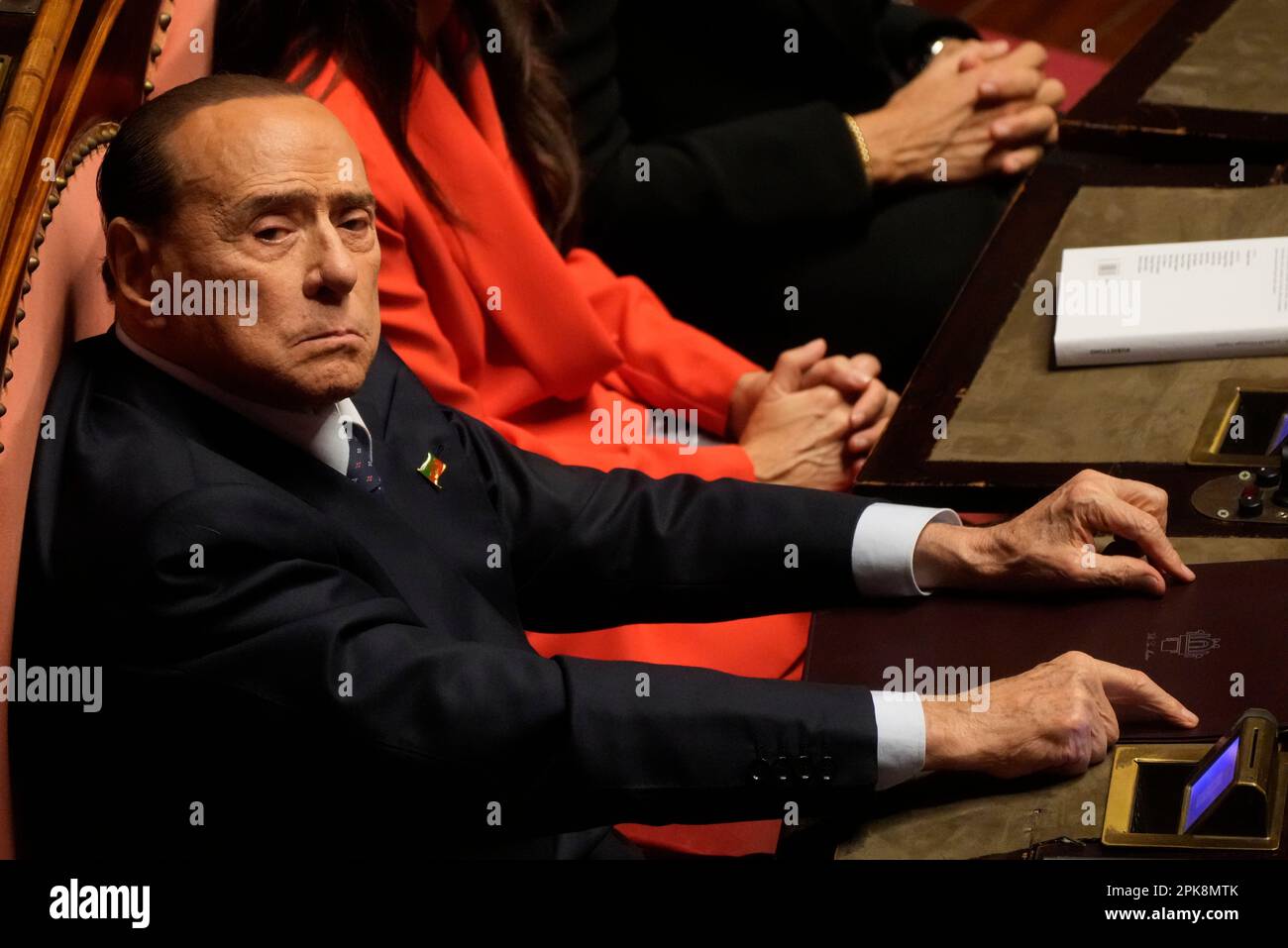 FILE - Forza Italia's president Silvio Berlusconi takes his seat in the ...