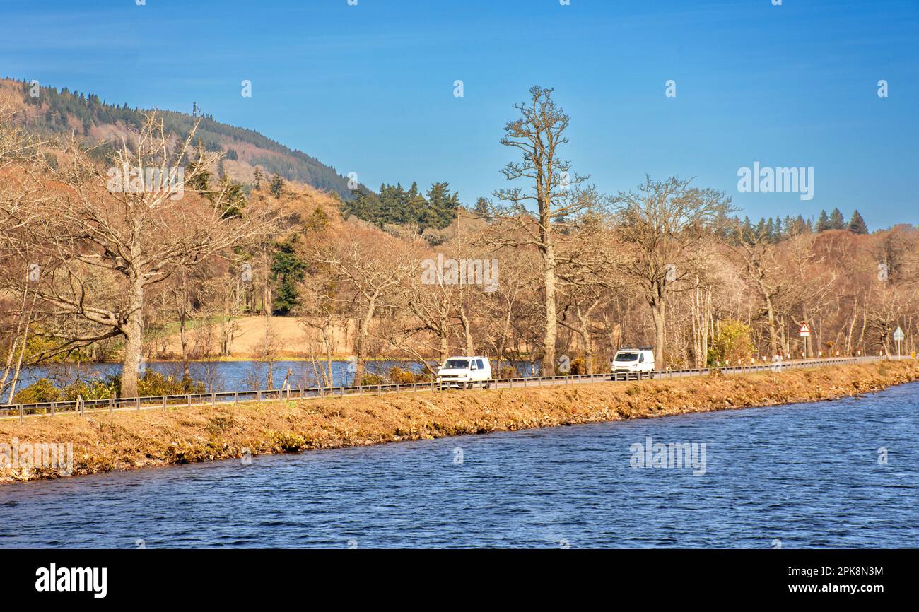 Traffic on the busy A82 road as it crosses Loch Dochfour near Inverness ...