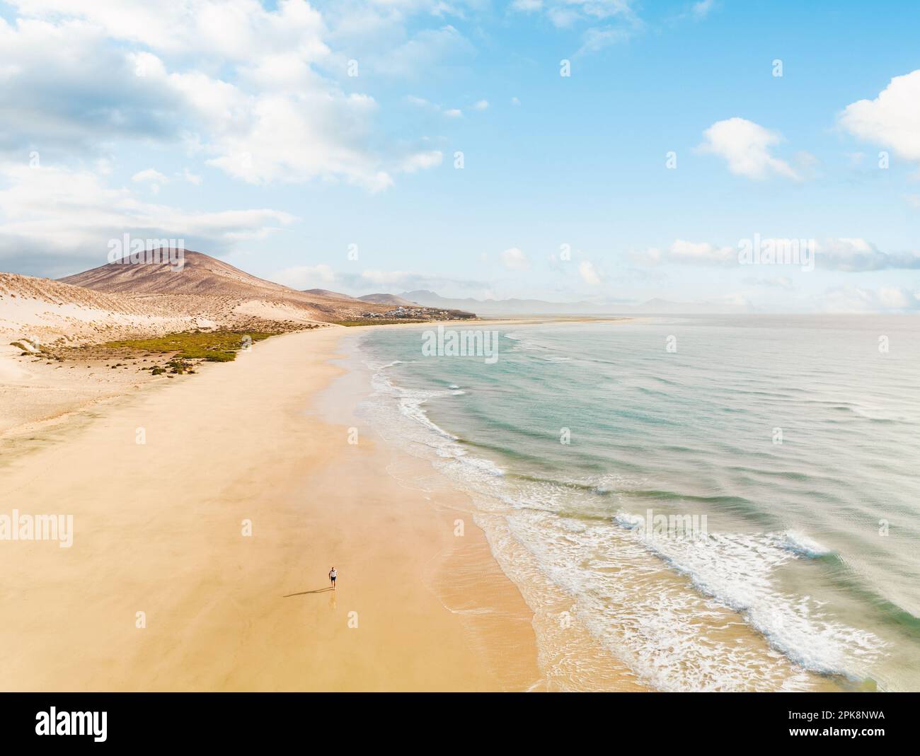 View from above, stunning aerial view of a person running on a ...