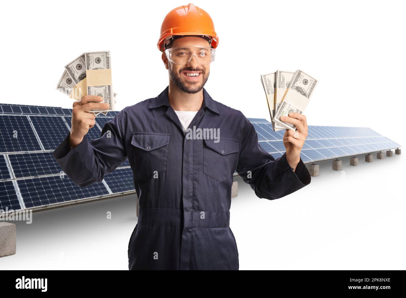 Factory worker wearing a protective helmet and goggles and holding ...