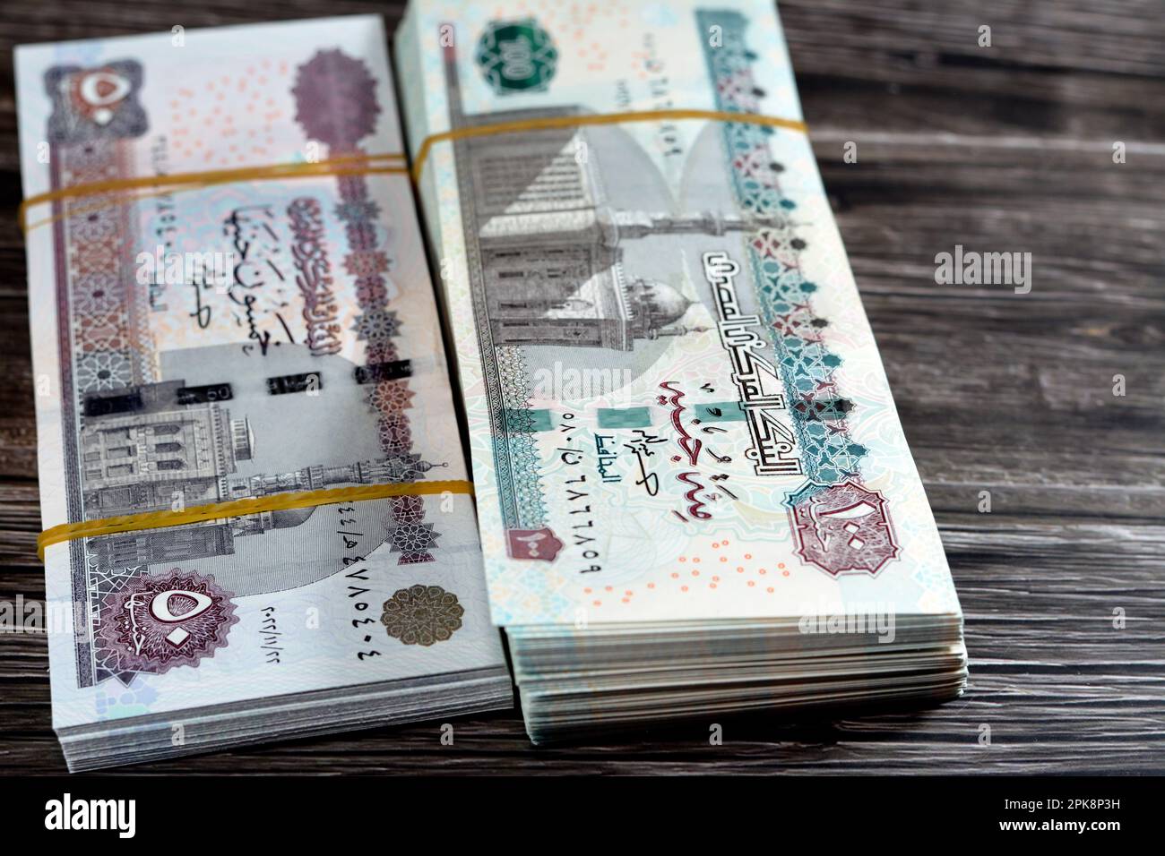 Stacks of Egypt money banknote bills of 100 and 50 EGP LE one hundred ...