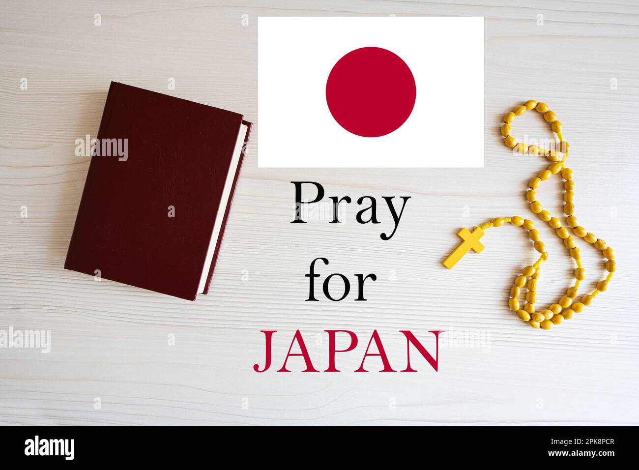 Pray for Japan. Rosary and Holy Bible background Stock Photo - Alamy
