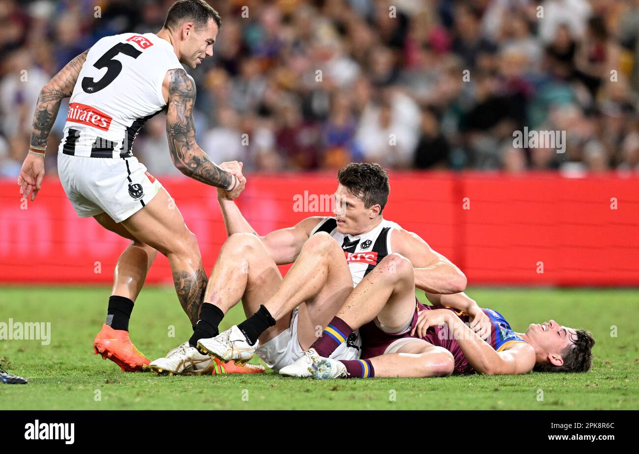 Brody Mihocek (centre) of the Magpies celebrates kicking a goal with ...
