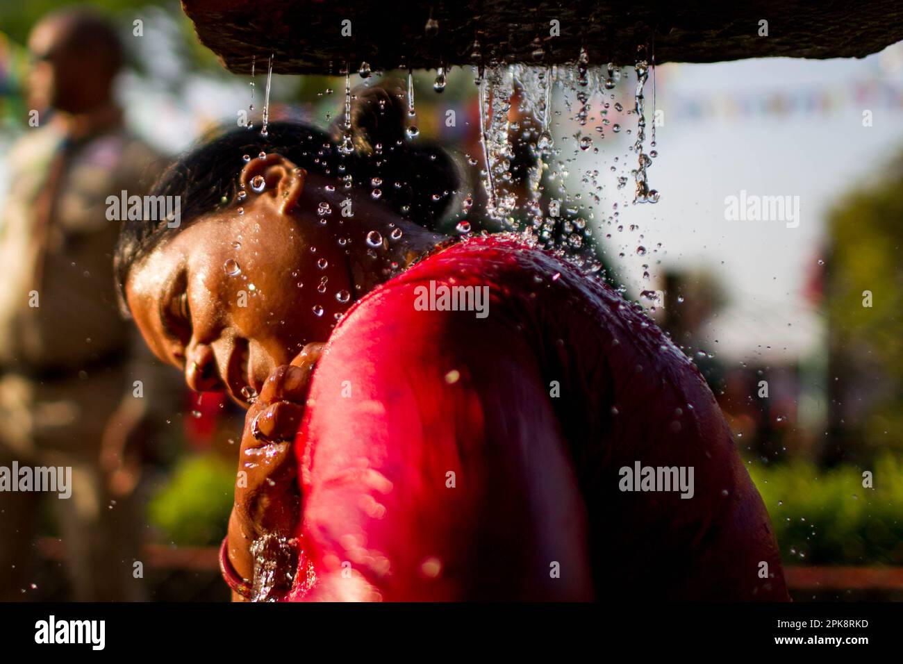 Kathmandu, Nepal. 6th Apr, 2023. A woman takes a holy bath during the ...