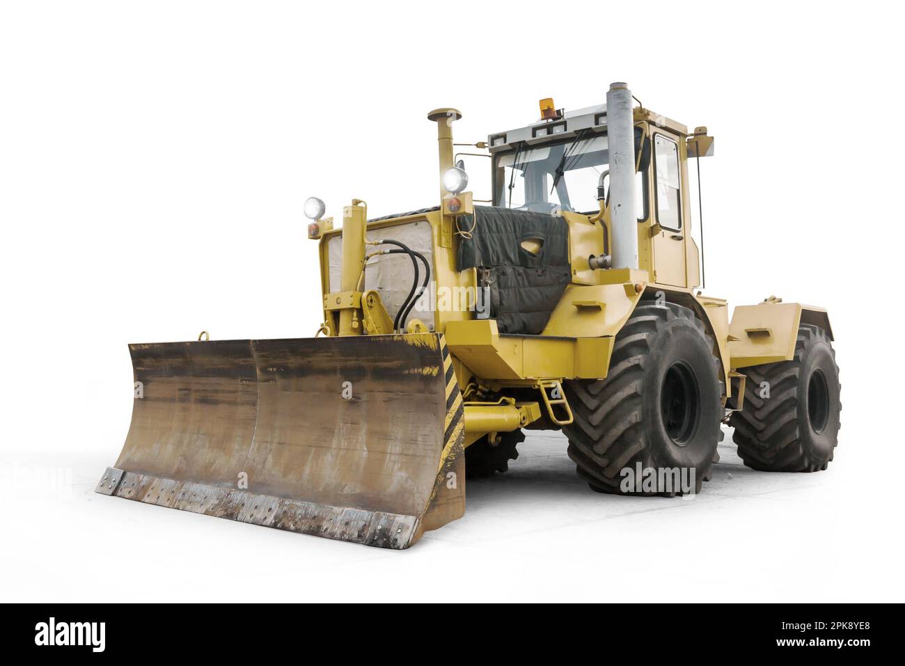 Yellow heavy wheeled tractor isolated on white background Stock Photo ...