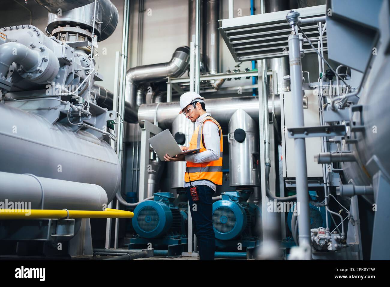 Factory engineering specialist monitoring hi-res stock photography and ...