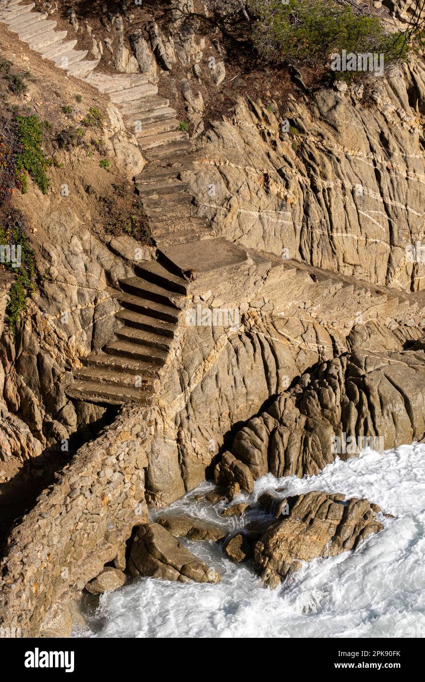 stairs on a cliff on a coast with strong waves Stock Photo - Alamy
