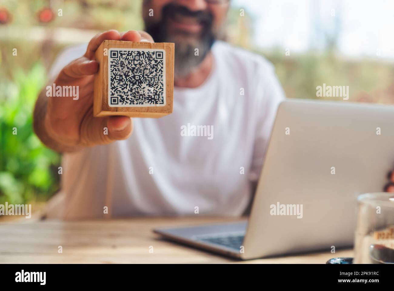 Man inbackgorund showing qr code menu at the cafe. Digital online ...