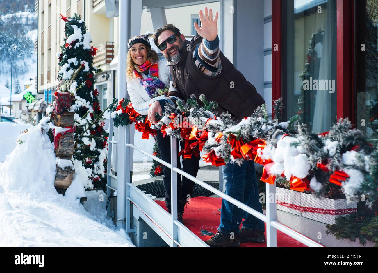 Couple, Smile, Wave, Veranda, stand, winter Stock Photo - Alamy
