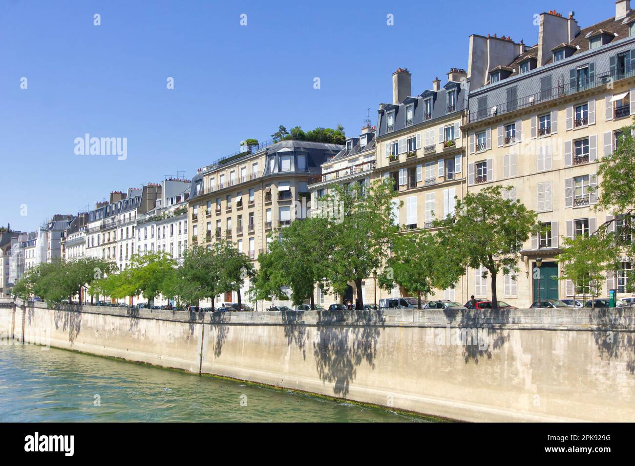 Cityscape in residential housing area in Paris along the river Seine ...