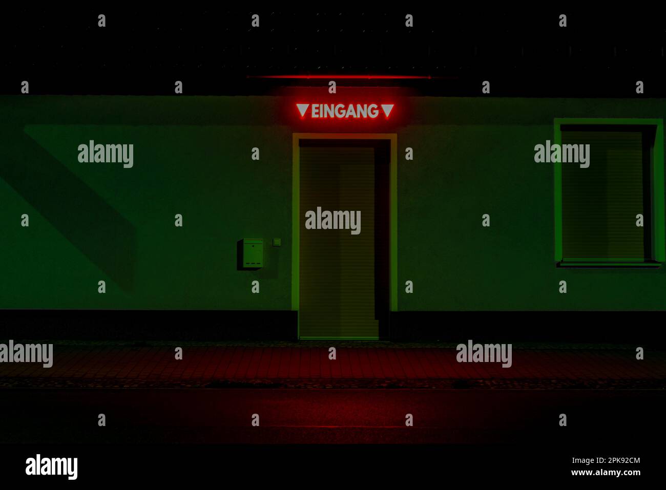 German language neon sign with the word entrance hi-res stock ...