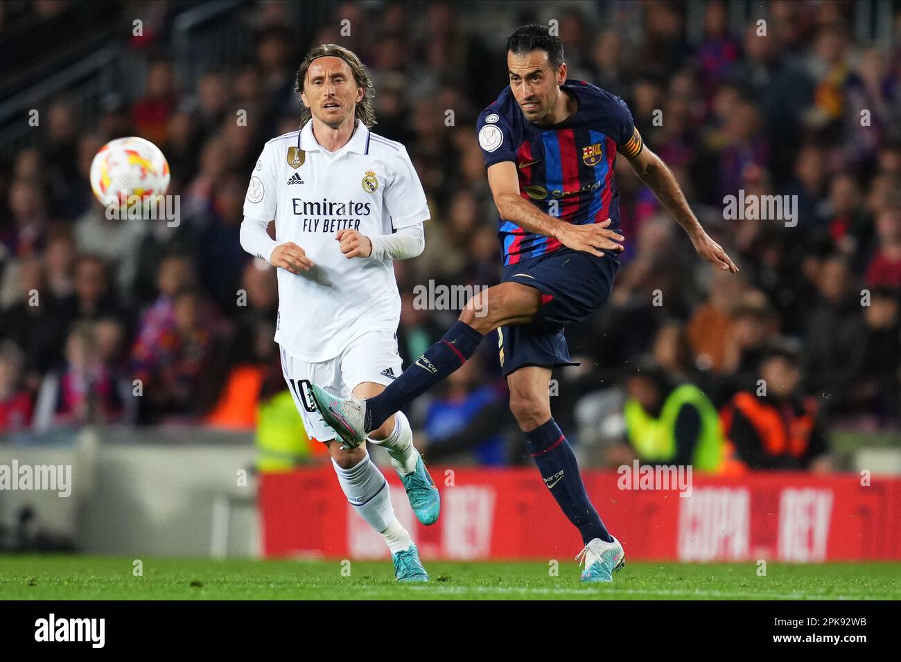 Sergio Busquets of FC Barcelona and Luka Modric of Real Madrid during ...