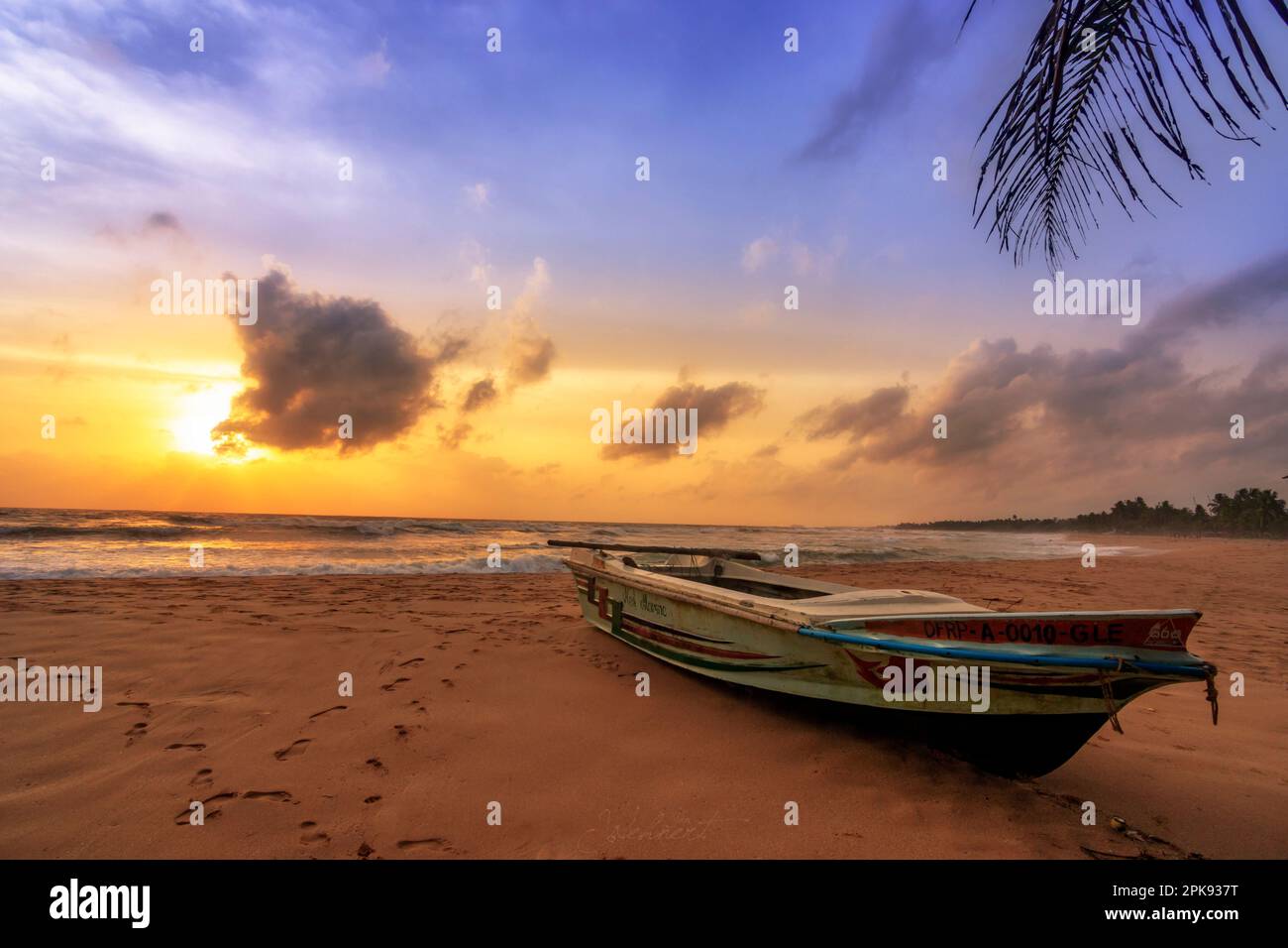 Sandy beach in Sri Lanka near Bentota, sunset in the evening, beautiful ...