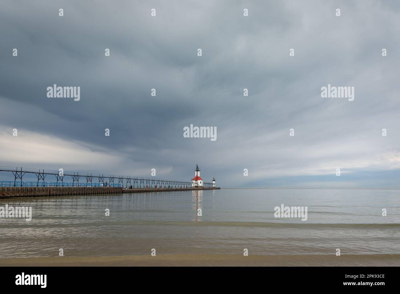 Storm clouds approaching St. Joseph lighthouse and beach. St. Joseph ...