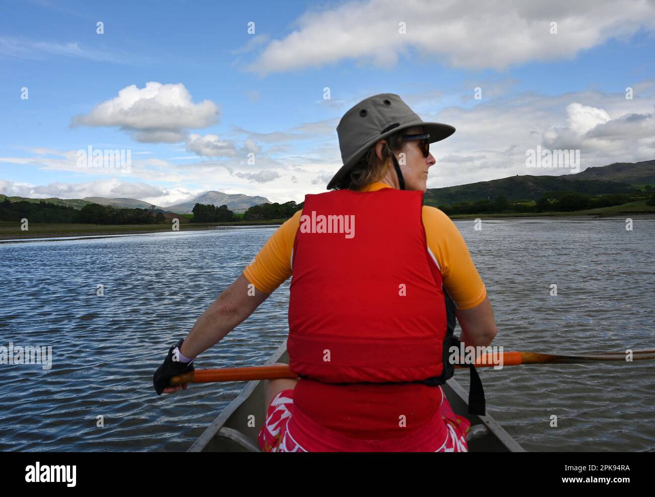 Woman in Canadian canoe Stock Photo - Alamy