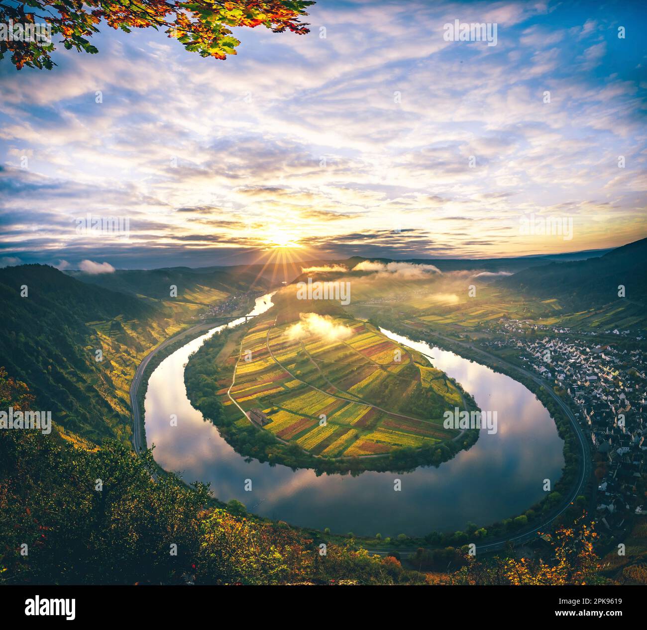 Beautiful sunrise in autumn over the river Mosel at the Mosel loop and ...